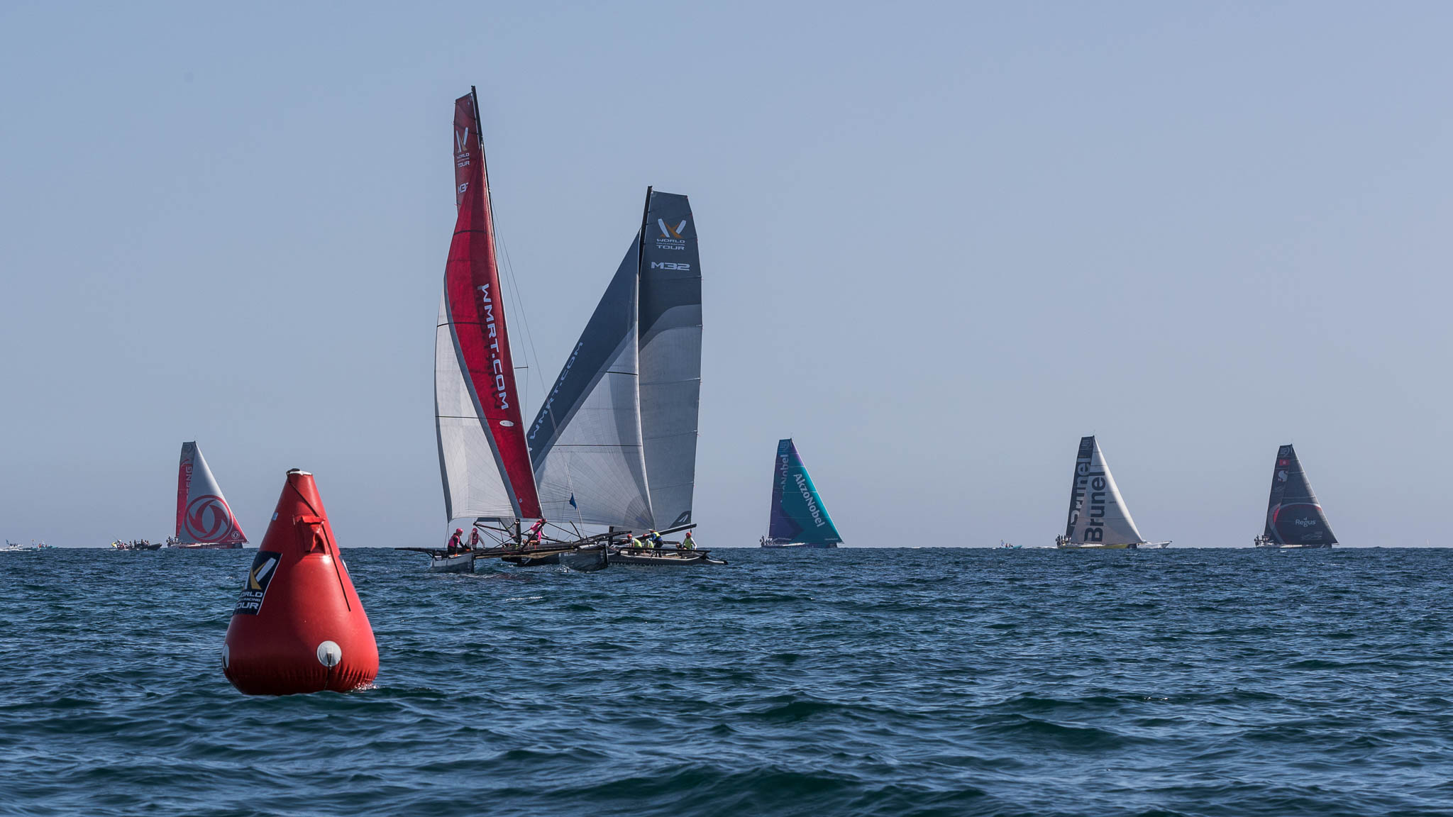 Packed Race Course as M32s Sail in the Shadows of Volvo Ocean 65 Boats ...
